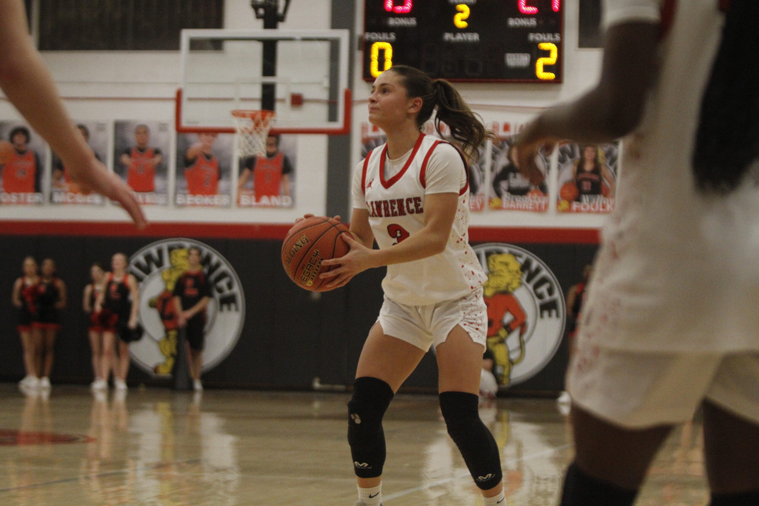 Lawrence boys and girls basketball teams suffer first loss of the ...